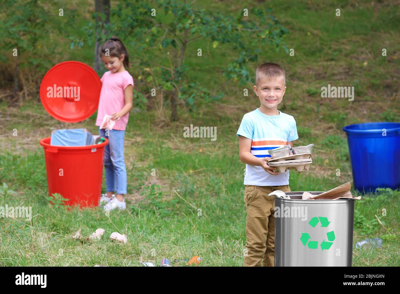 Kids collecting trash hi-res stock photography and images - Alamy