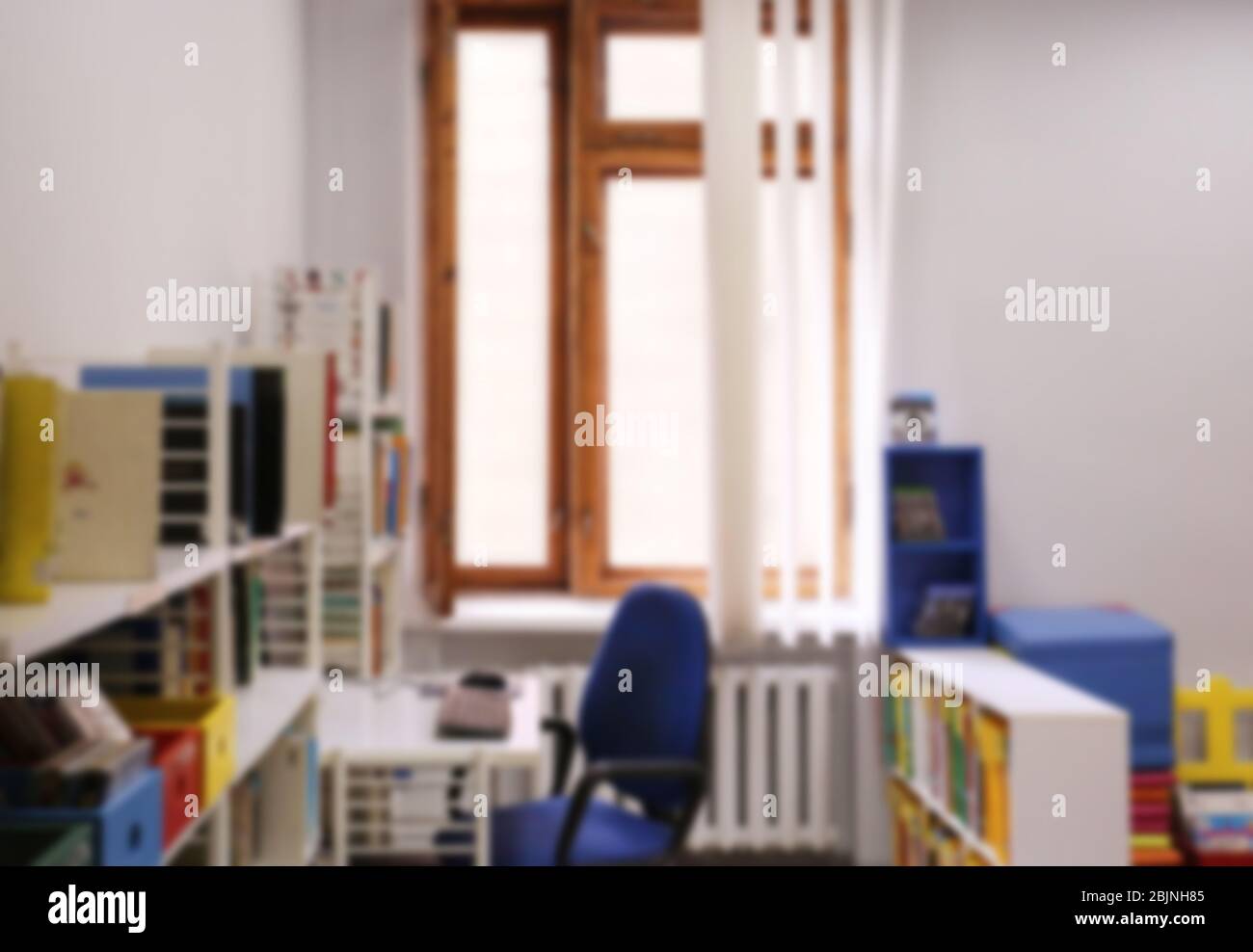 Interior of modern library, blurred background Stock Photo - Alamy
