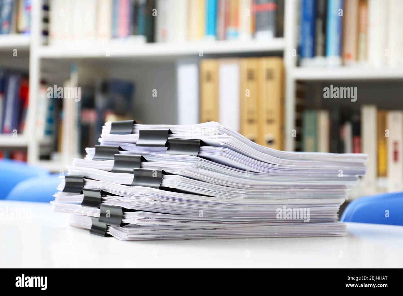 Stack of documents on table in archive Stock Photo - Alamy