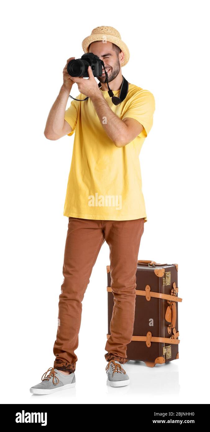 Attractive male tourist on white background Stock Photo - Alamy