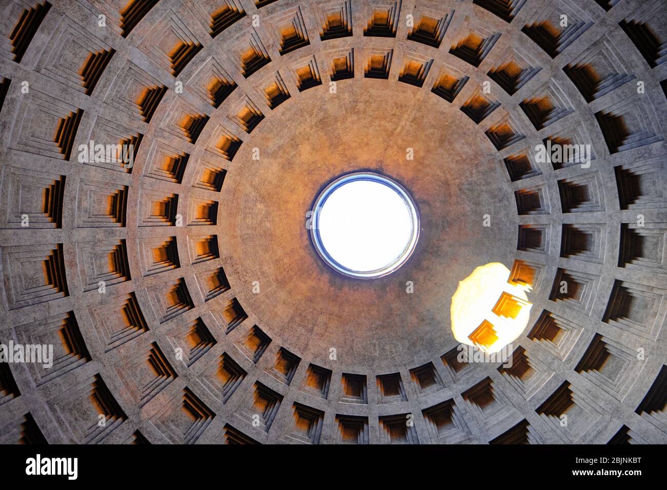 Looking up into Pantheon carved stone dome with central skylight from ...