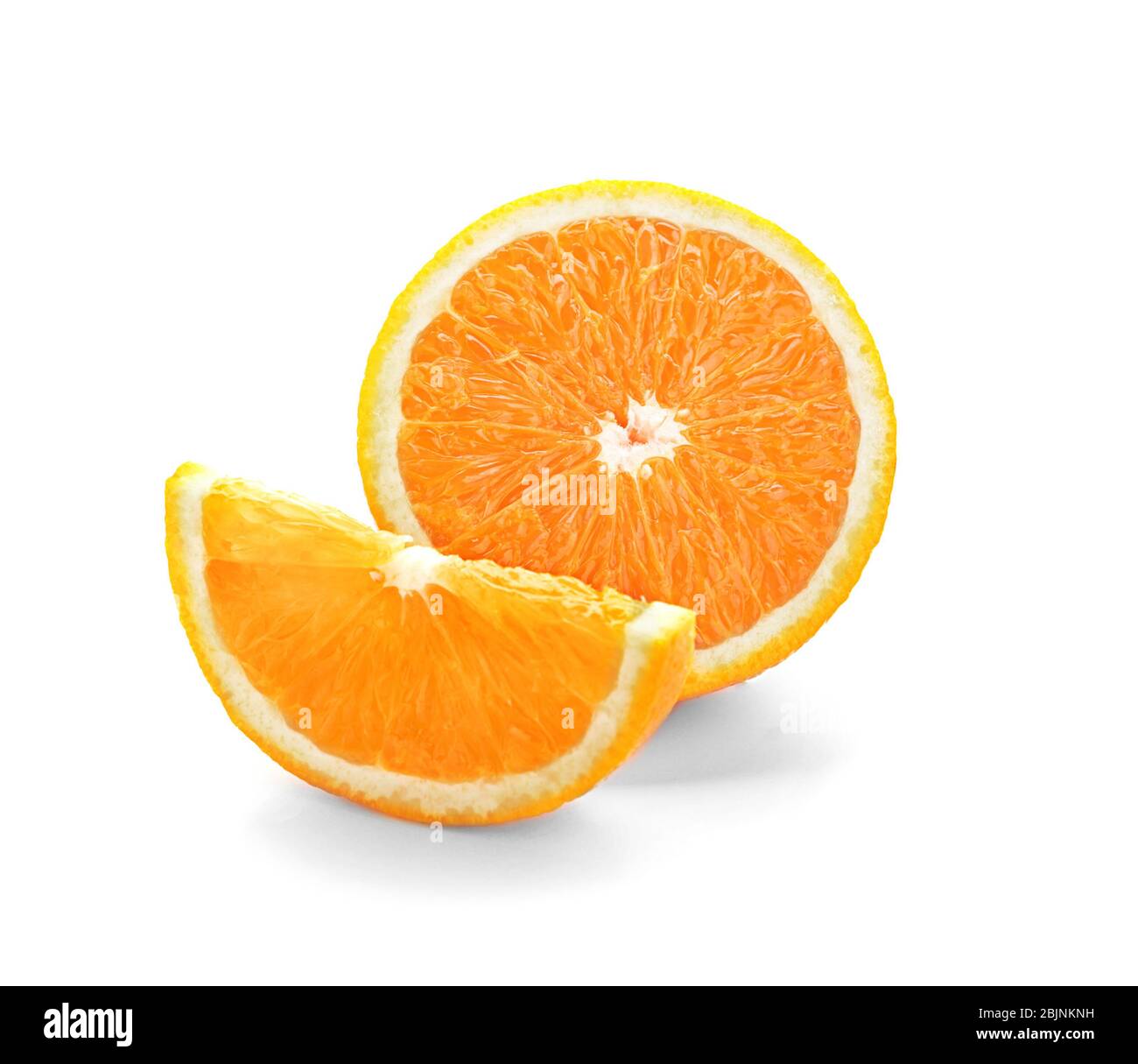 Yummy cut orange on white background Stock Photo - Alamy