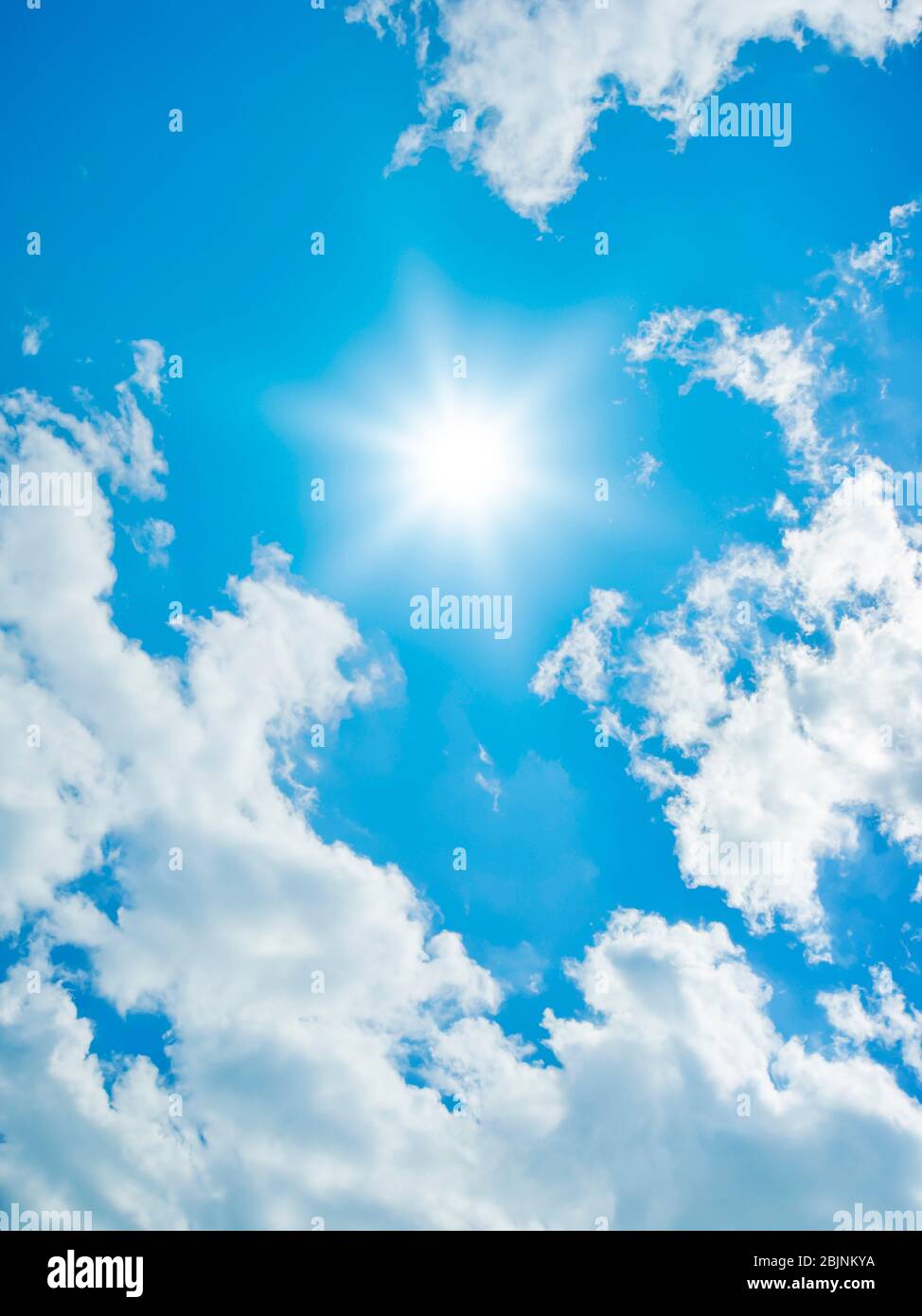 blue sky with sun and clouds, Germany, Bavaria Stock Photo - Alamy