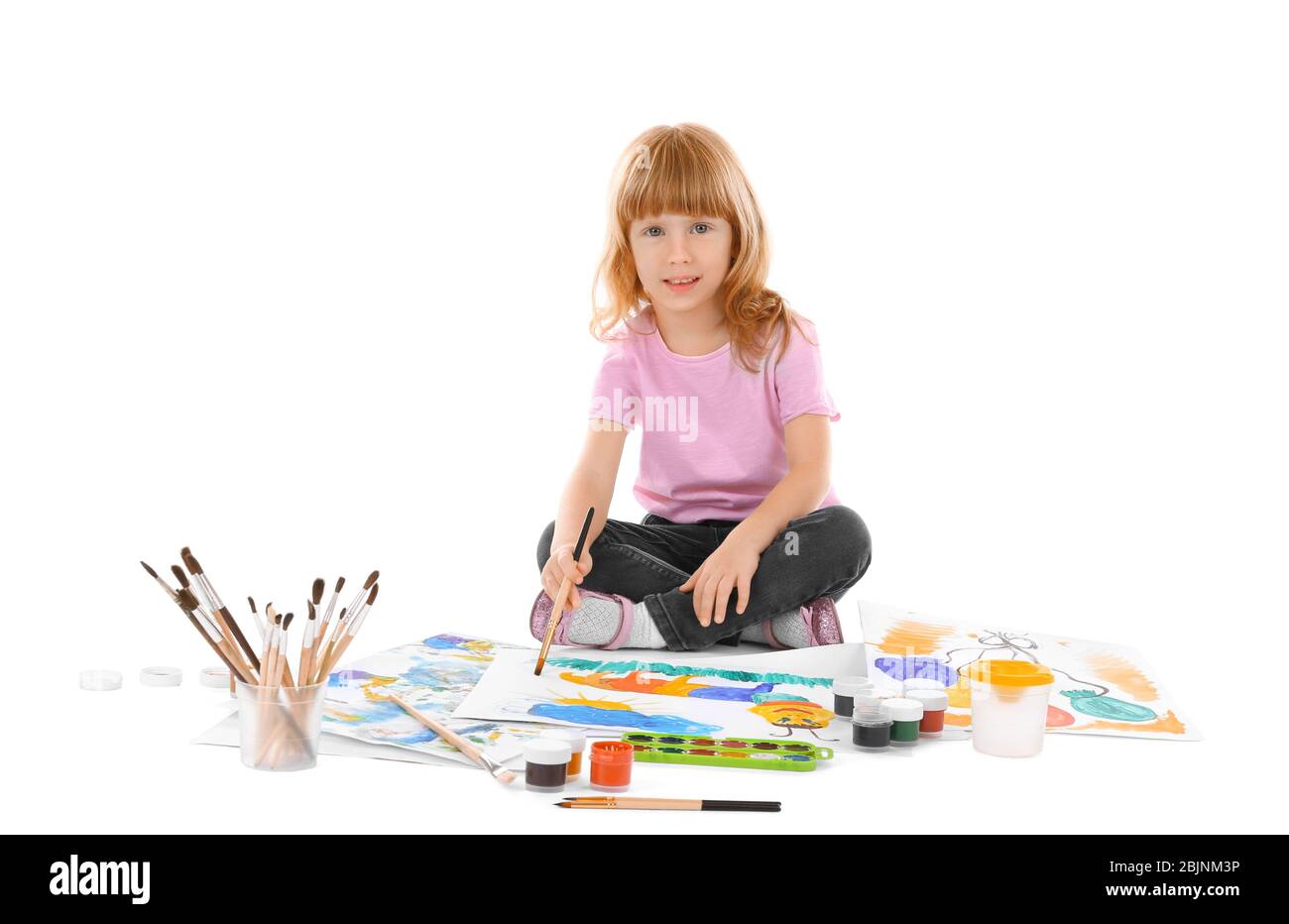 Talented girl painting against white background Stock Photo - Alamy