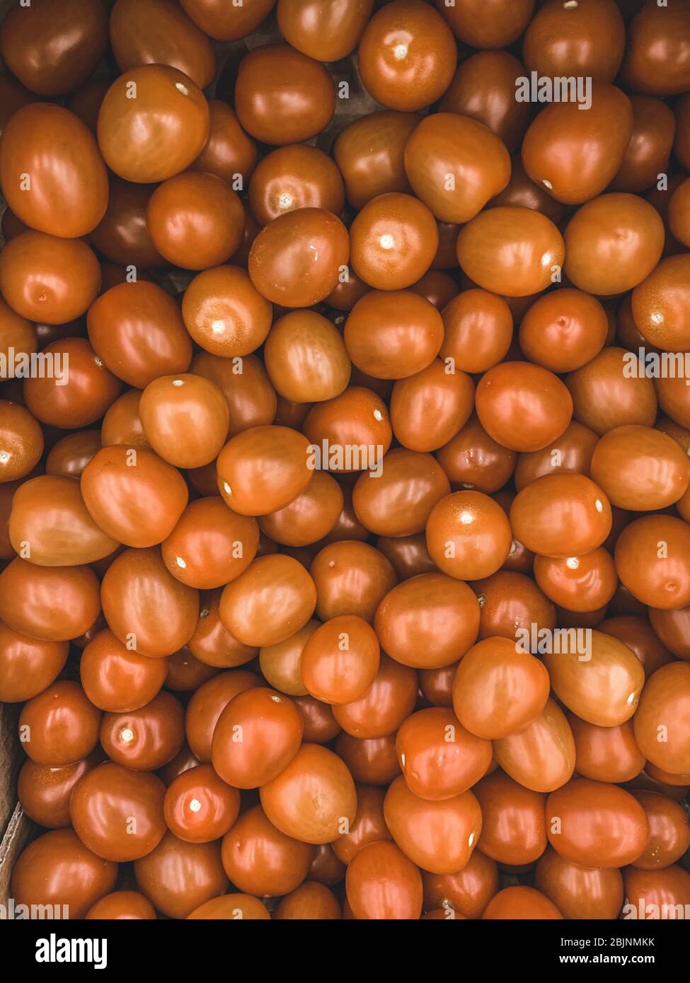 lots of ripe tomato vegetables for cooking like a background Stock ...