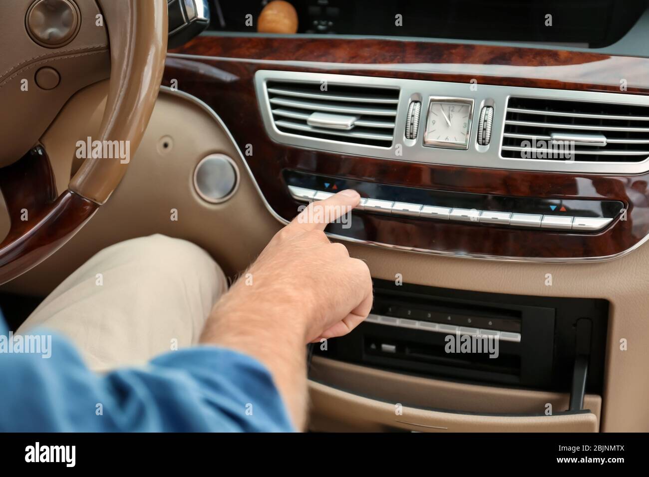 Man turning on car air hi-res stock photography and images - Alamy