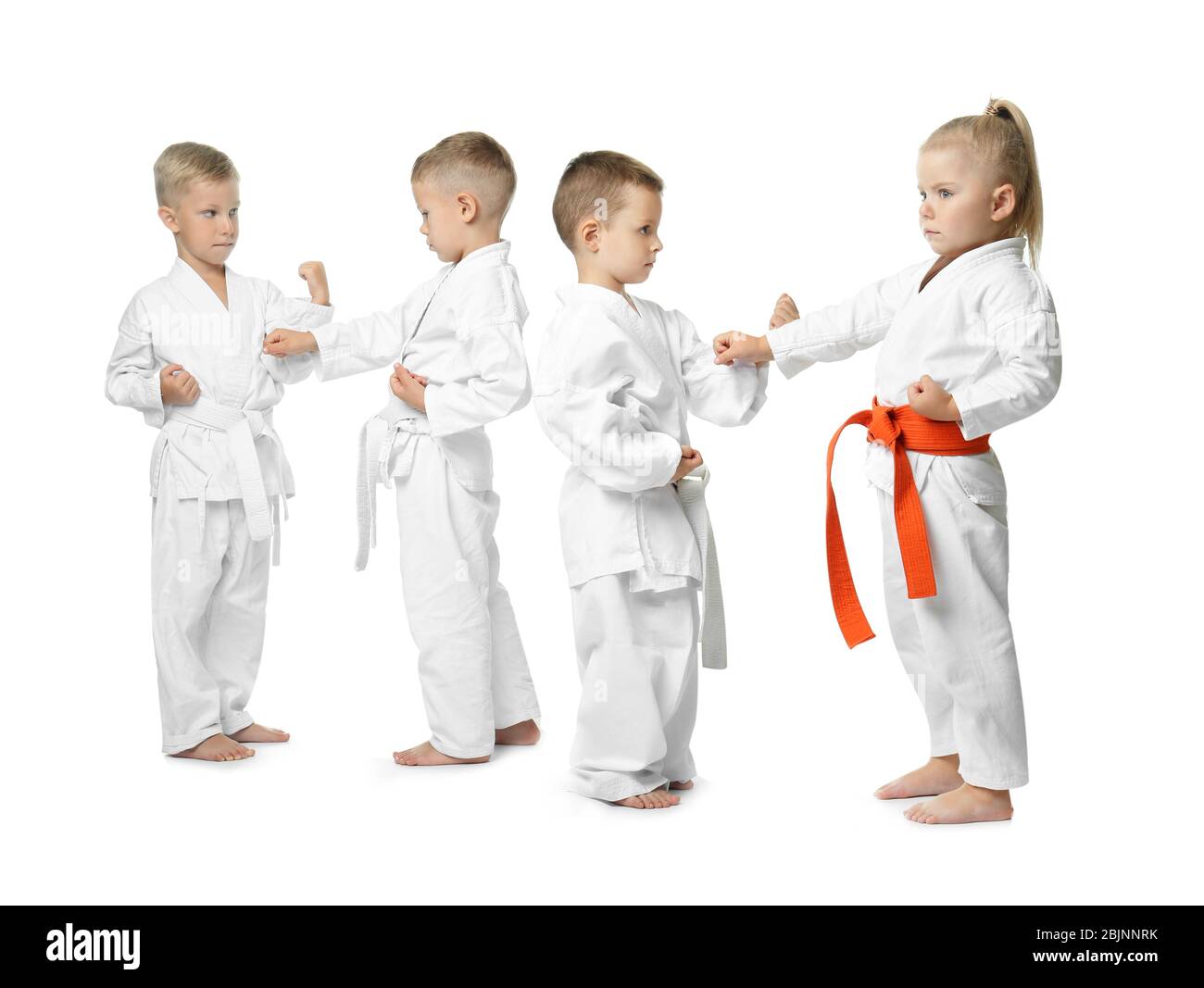 Little children practicing karate on white background Stock Photo - Alamy