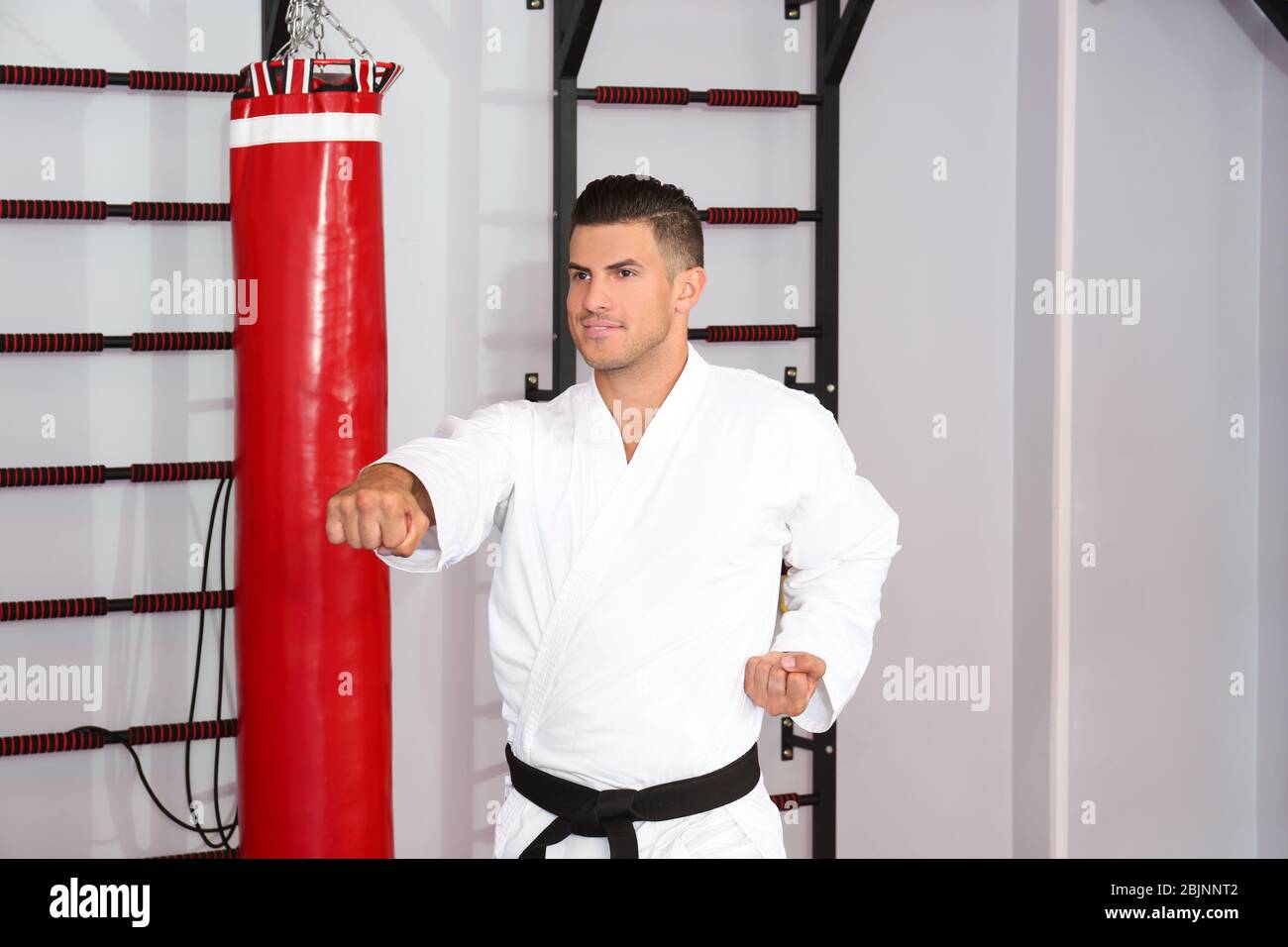 Practicing martial arts in dojo hi-res stock photography and images - Alamy