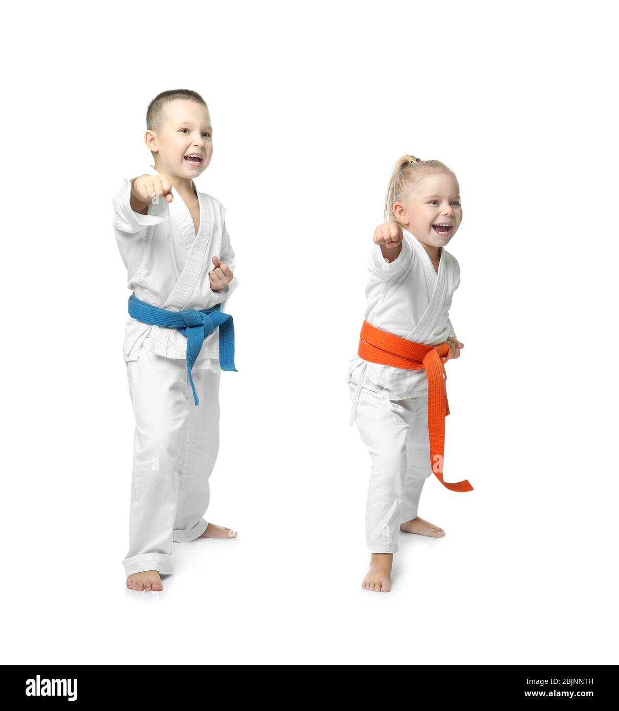 Little children practicing karate on white background Stock Photo - Alamy