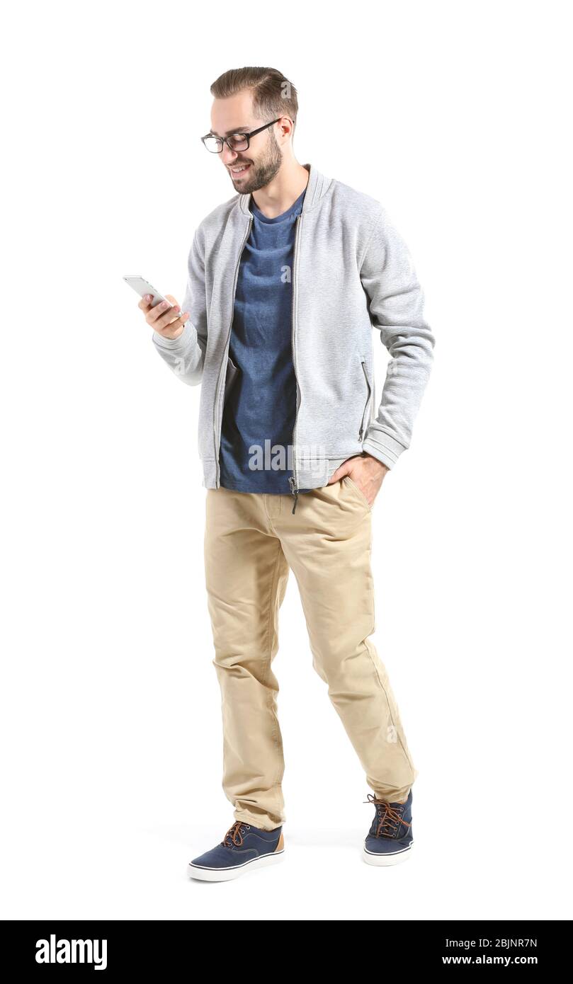Attractive man using smartphone standing Cut Out Stock Images ...