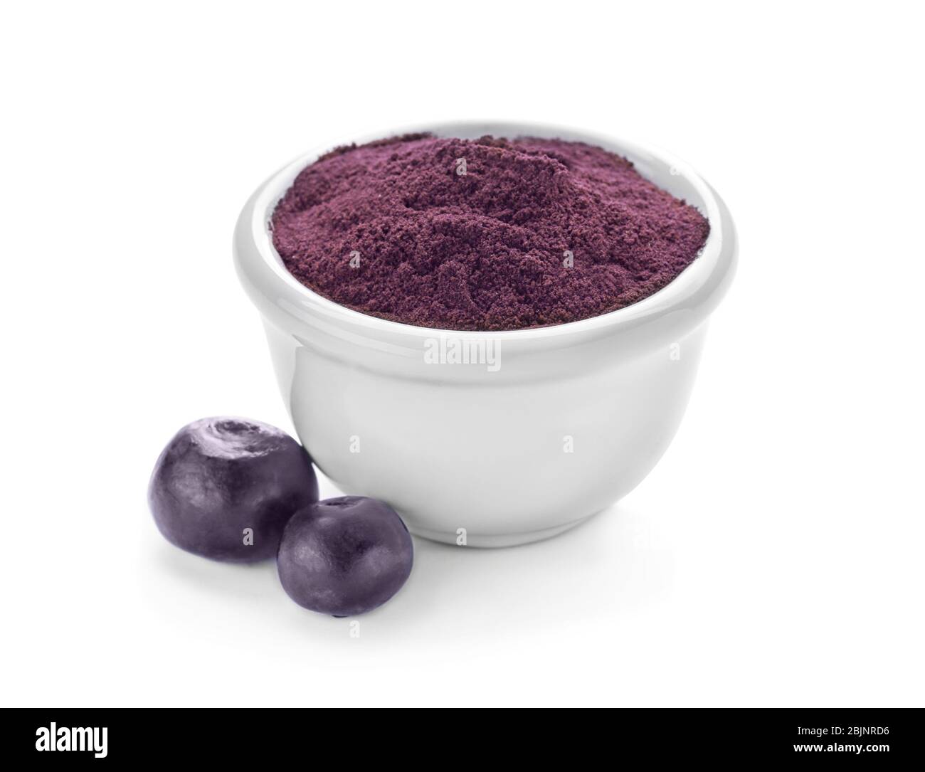 Ceramic bowl with acai powder on white background Stock Photo - Alamy