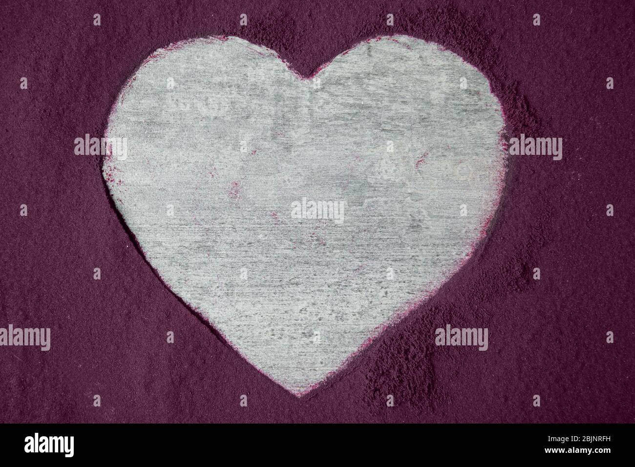 Heart-shaped frame made from acai powder on grey background Stock Photo ...