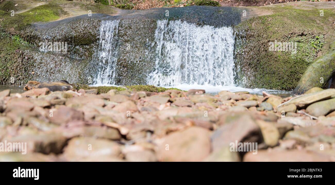 Little waterfall and dried out riverbed Stock Photo - Alamy