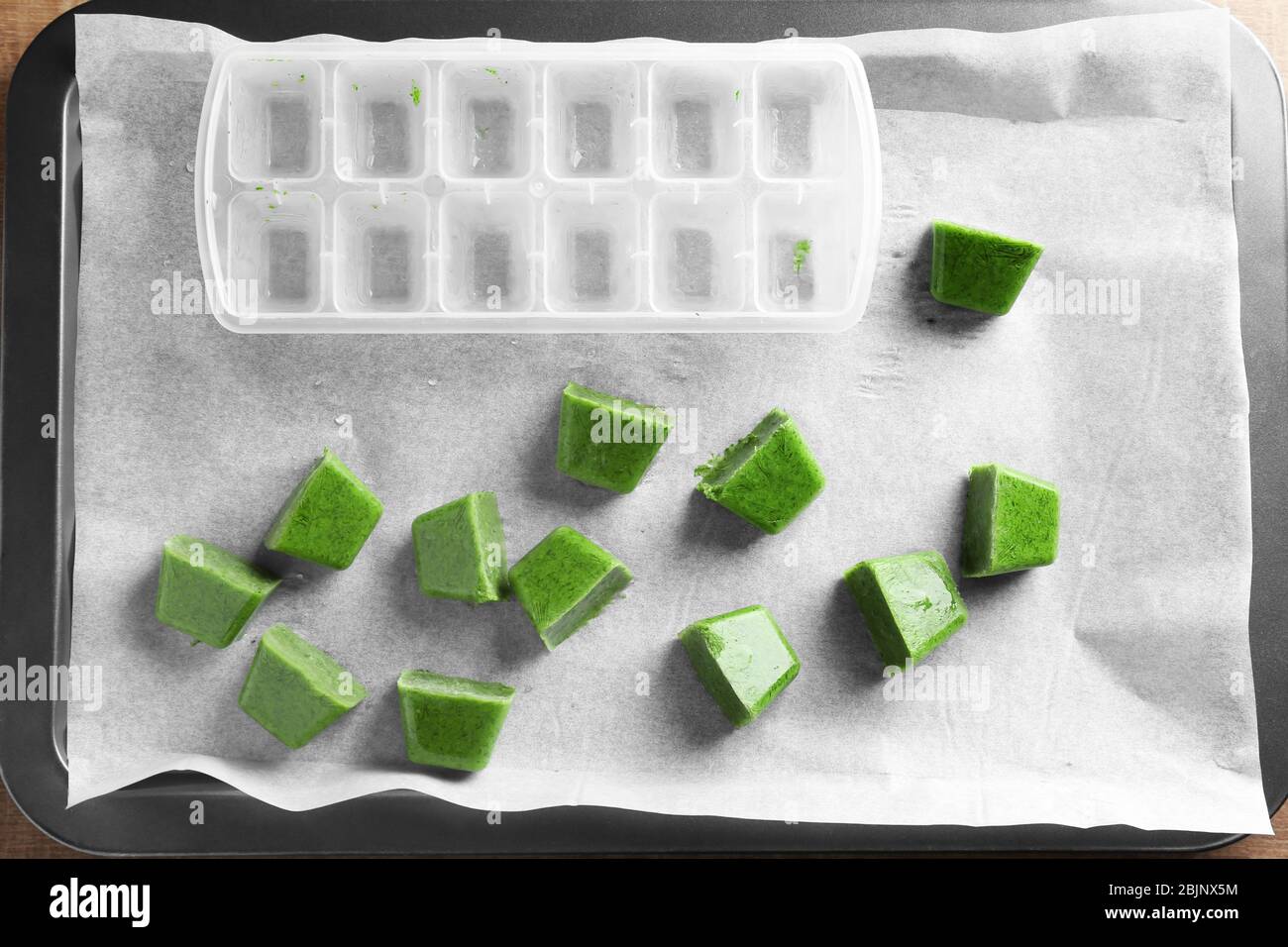 Tray with cubes of frozen vegetable puree Stock Photo - Alamy