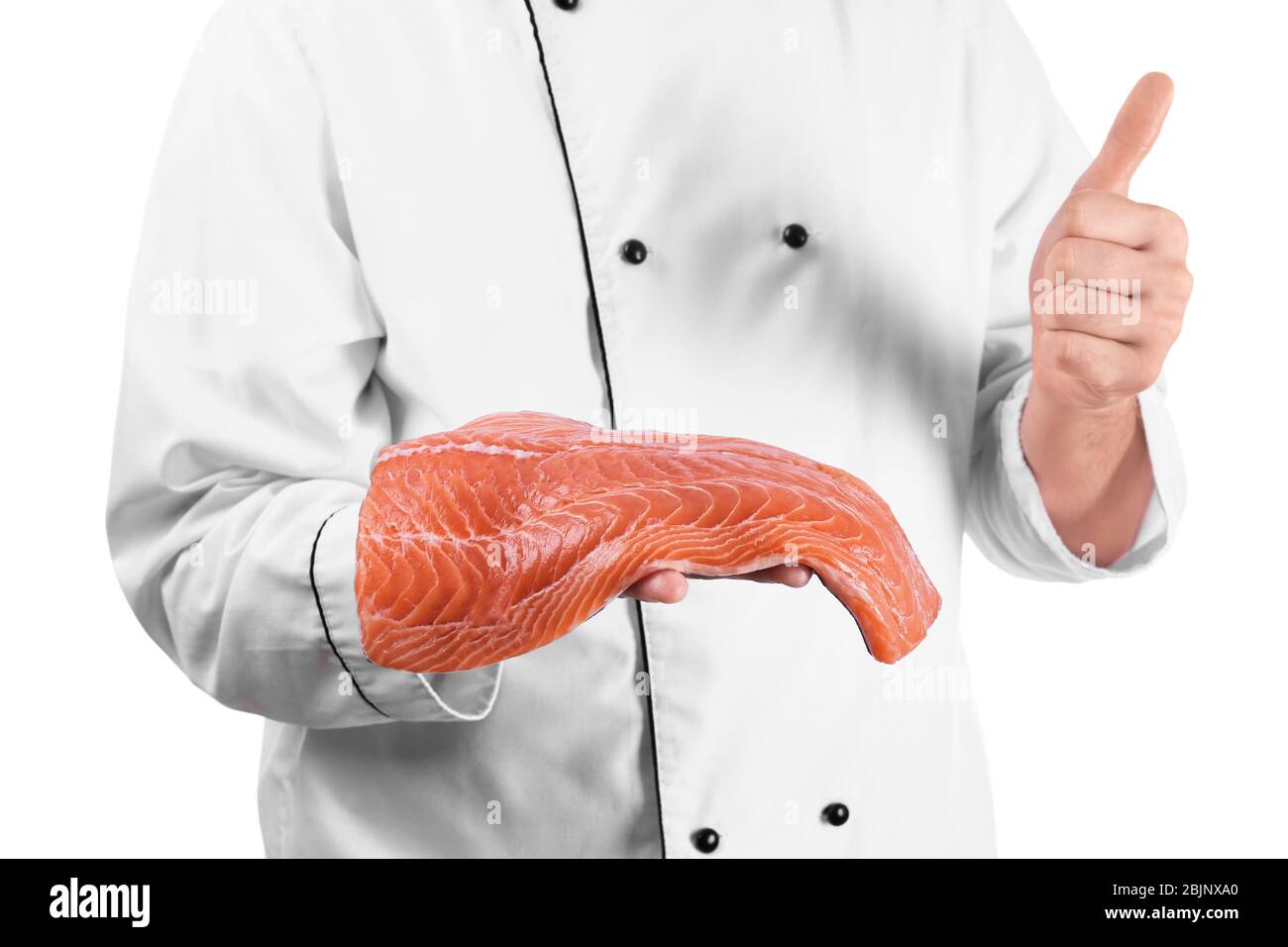 Chef holding fresh raw salmon fillet, isolated on white Stock Photo - Alamy