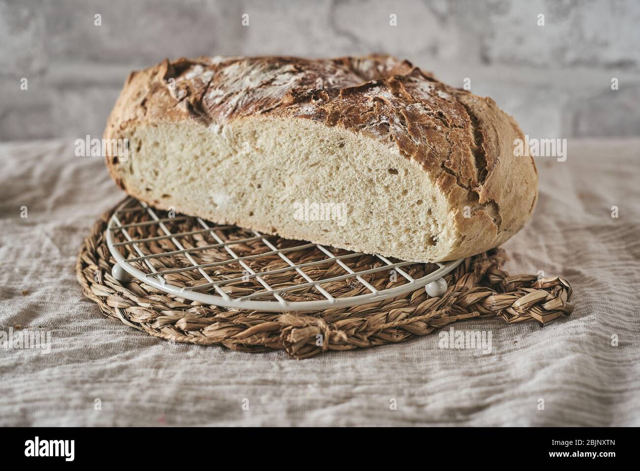 Baked and sliced homemade traditional village bread Stock Photo - Alamy