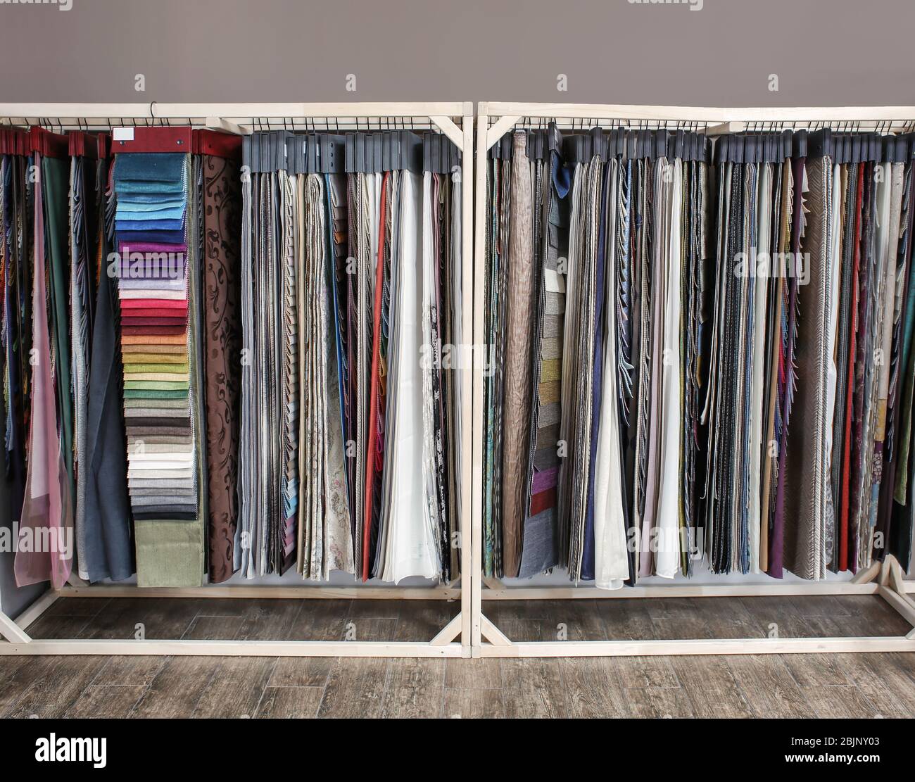 Assortment of fabric samples for curtains in shop Stock Photo - Alamy