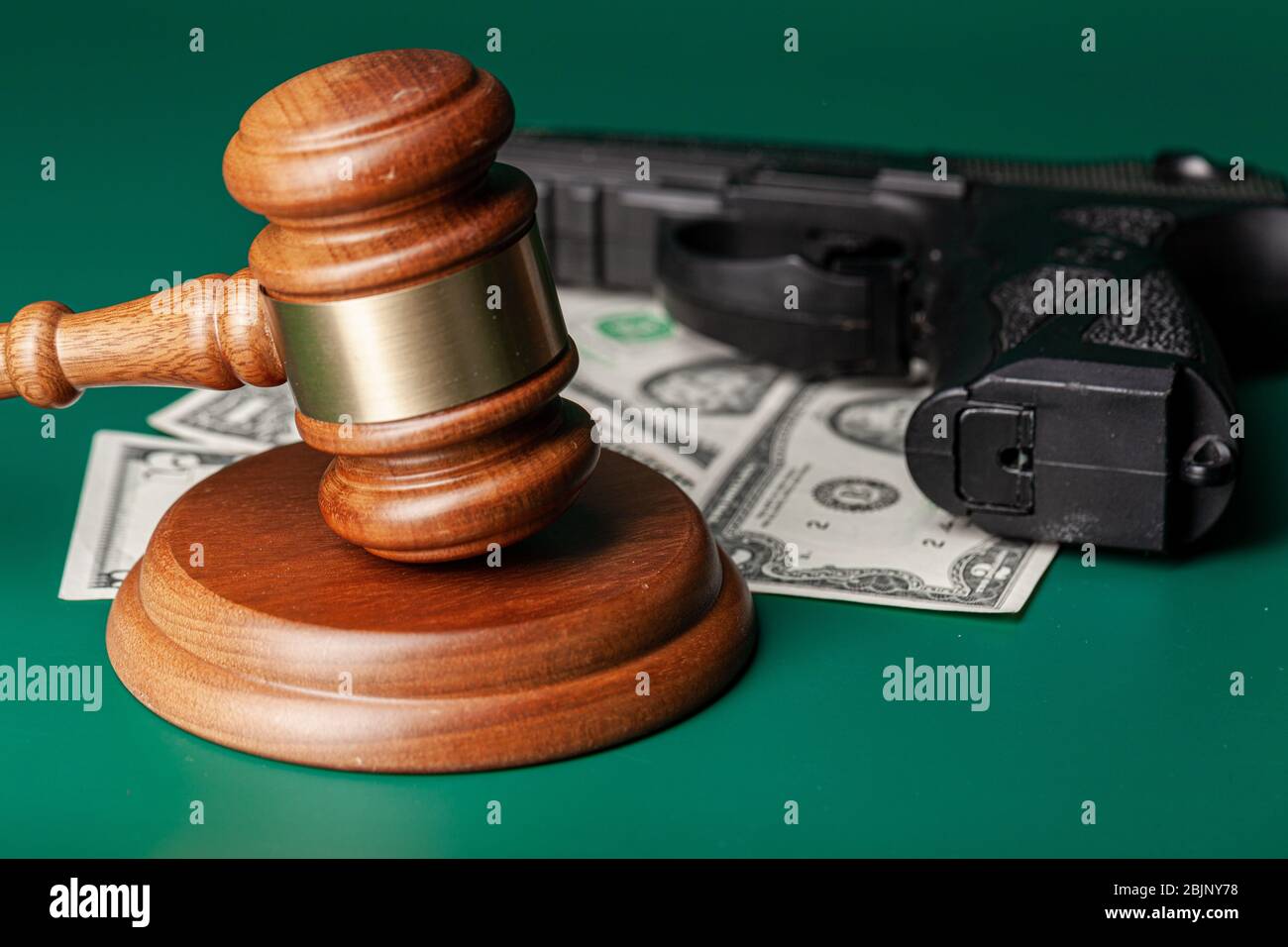 Law mallet and a stack of money Stock Photo - Alamy