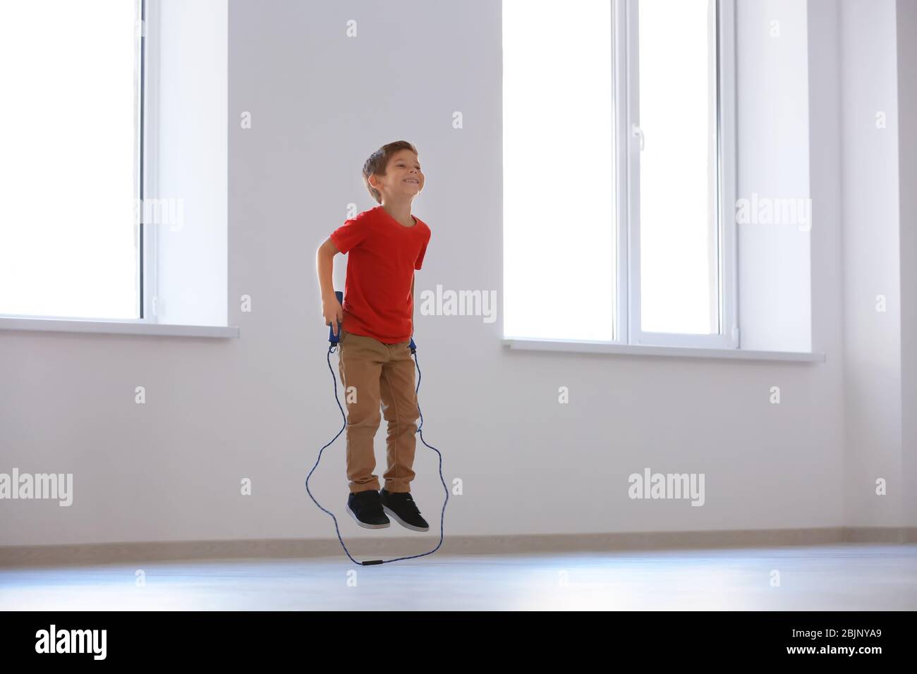 Boy skipping rope hi-res stock photography and images - Alamy