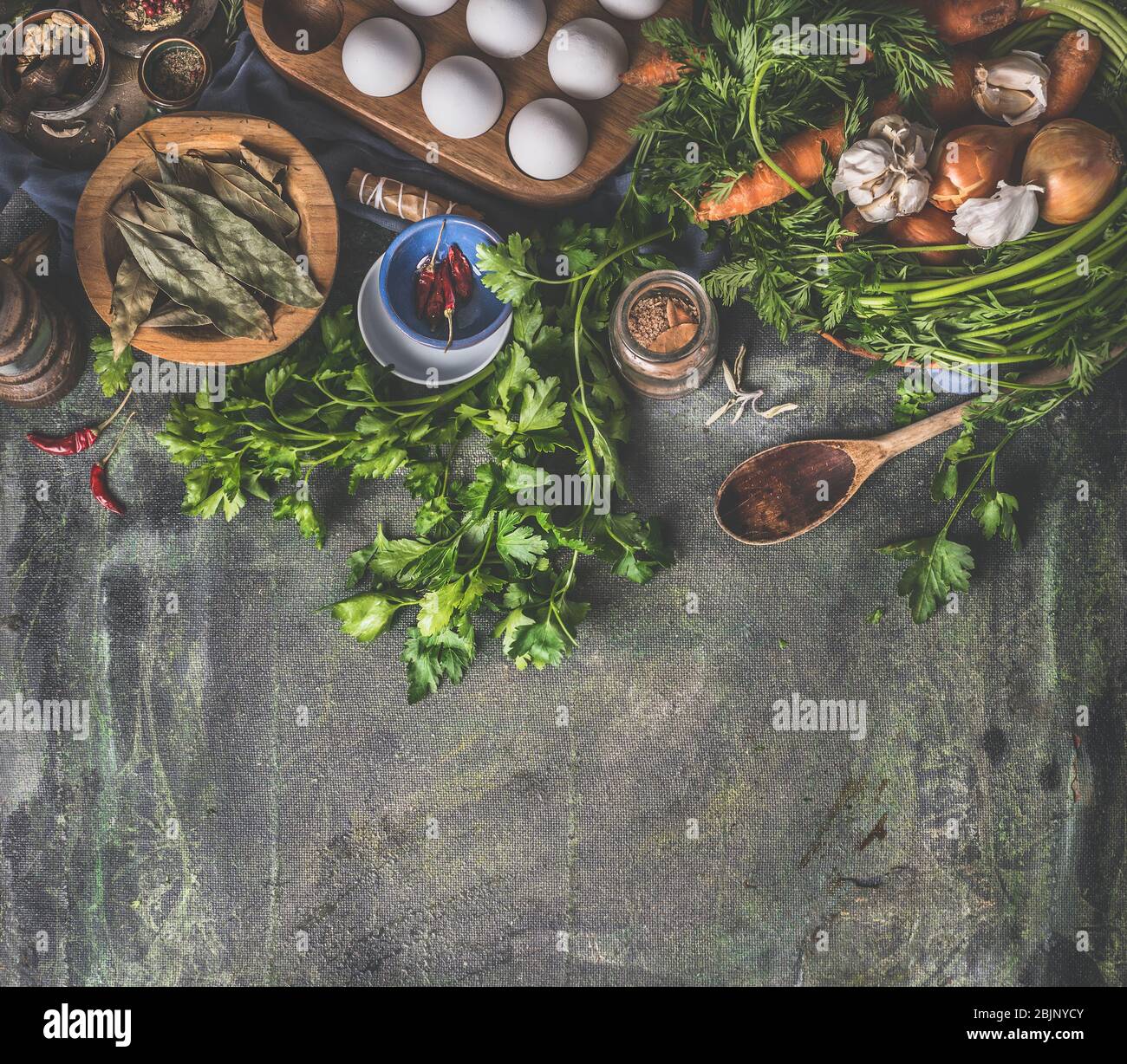 Dark rustic food background. Herbs and seasoning with wooden vintage ...