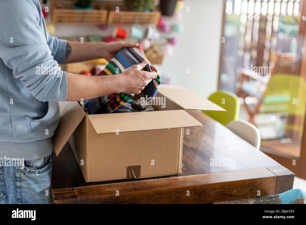 Unpacking delivery clothes hi-res stock photography and images - Alamy