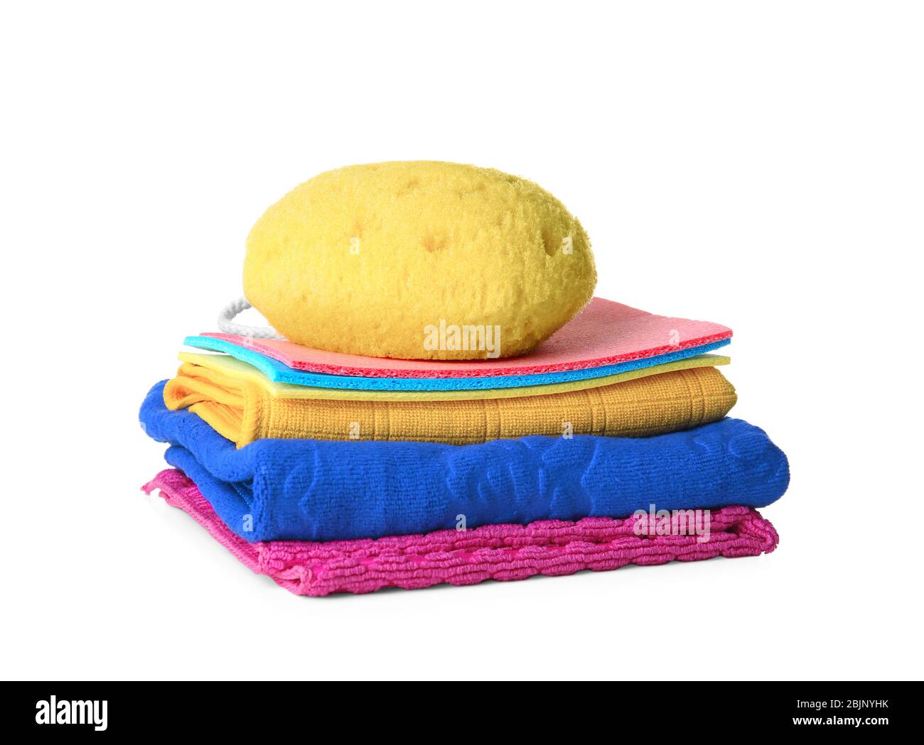 Sponge and many different rags on white background Stock Photo - Alamy