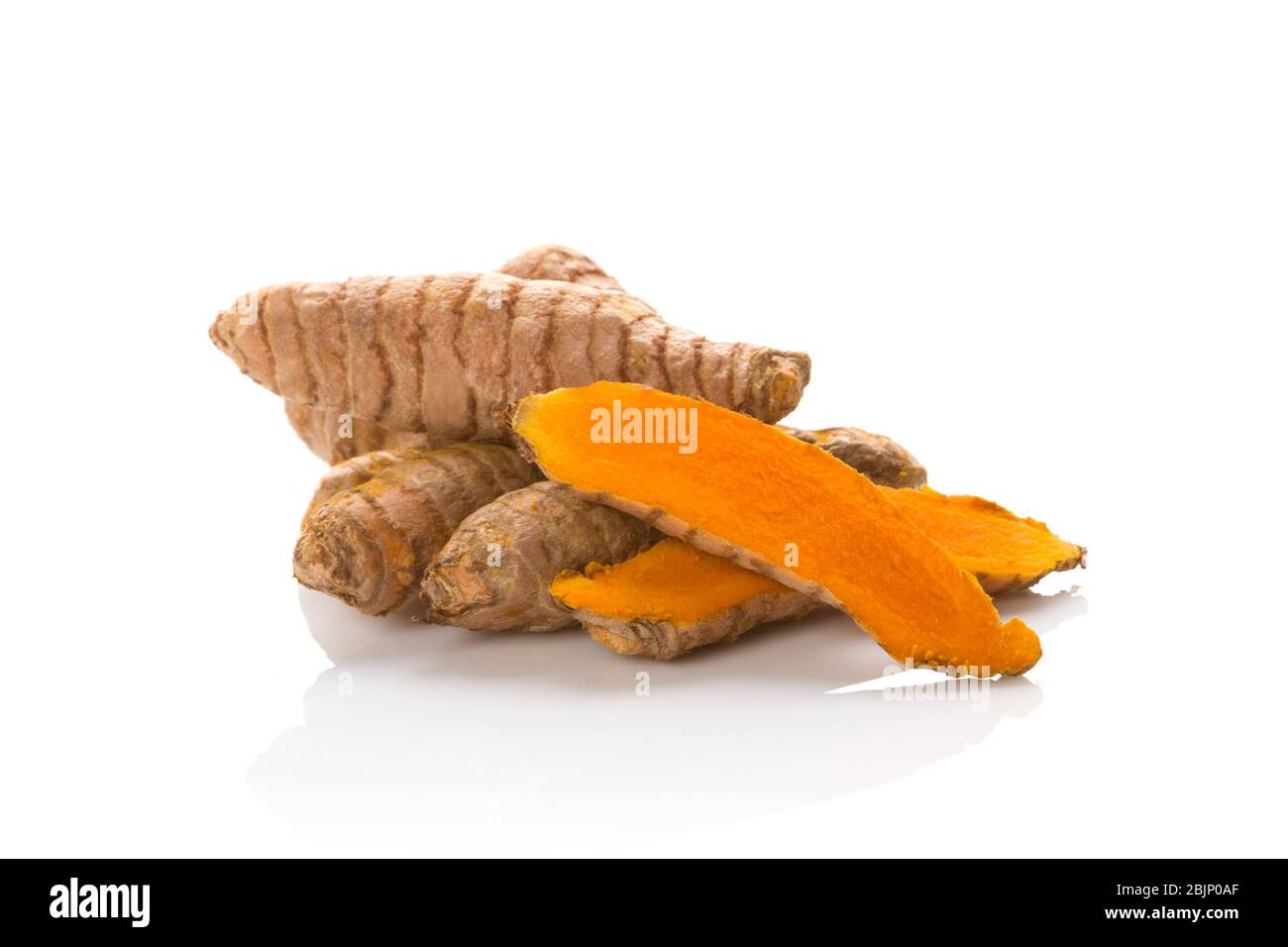 Turmeric root on white background. Natural antioxidant, herbal remedy ...