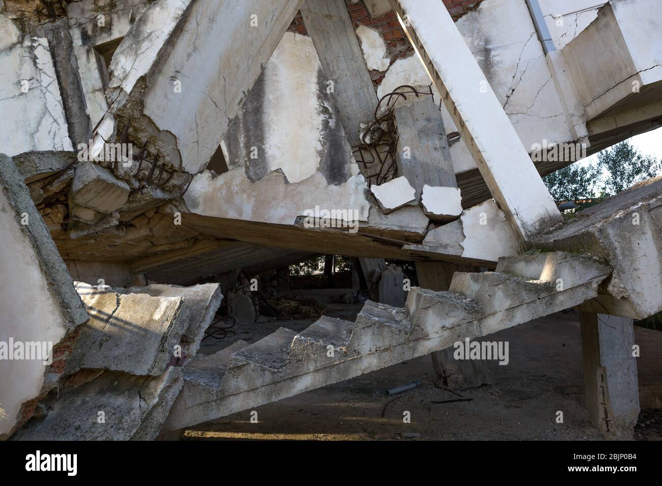 Destroyed house by earthquake. Natural disaster Stock Photo - Alamy