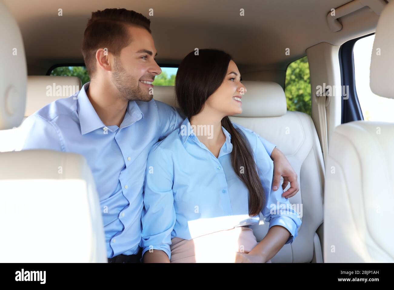 Man woman on backseat car hi-res stock photography and images - Alamy