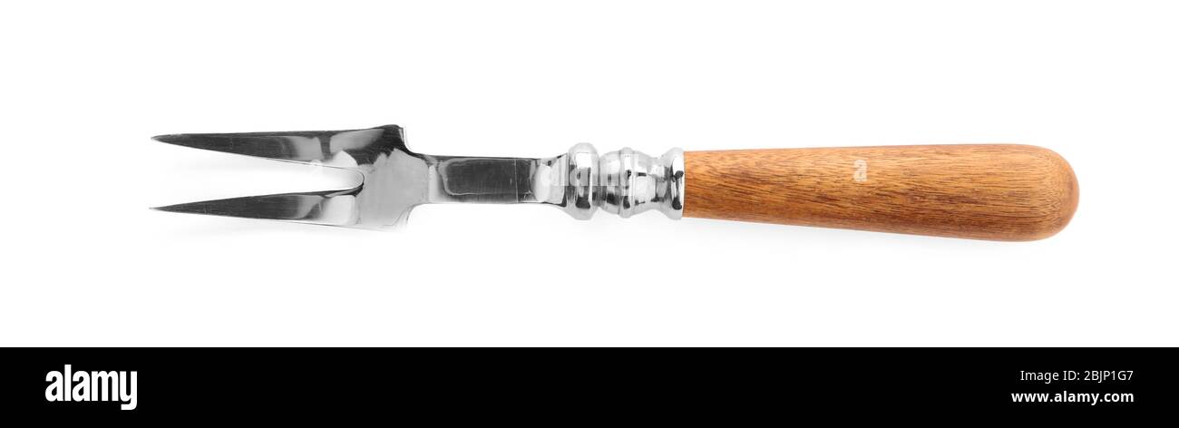 Meat fork with wooden handle on white background Stock Photo - Alamy