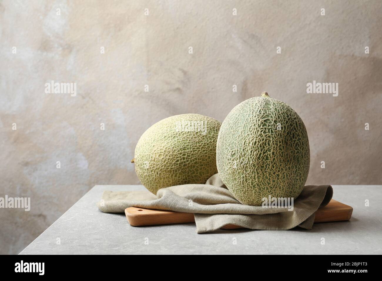 Ripe melons on table Stock Photo - Alamy