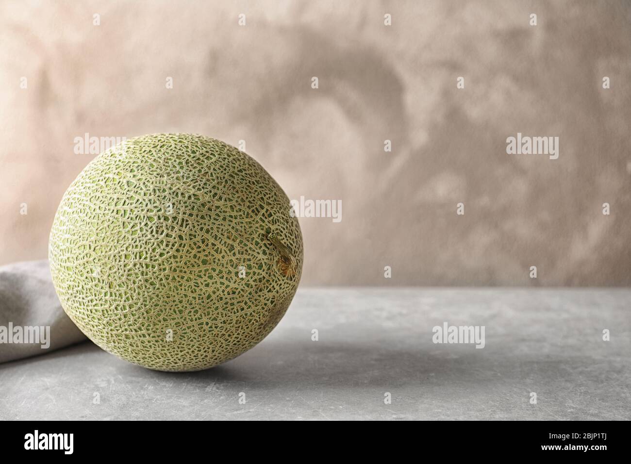 Ripe melon on table Stock Photo - Alamy