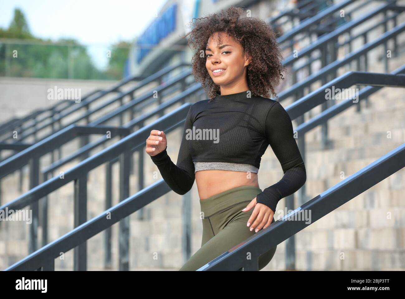 American woman running outdoors hi-res stock photography and images - Alamy