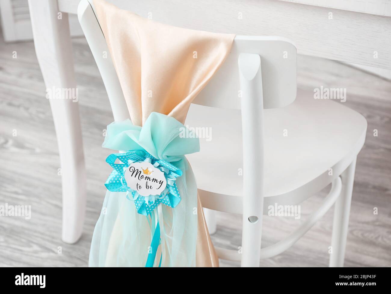 Chair decorated with award ribbon, indoors Stock Photo - Alamy