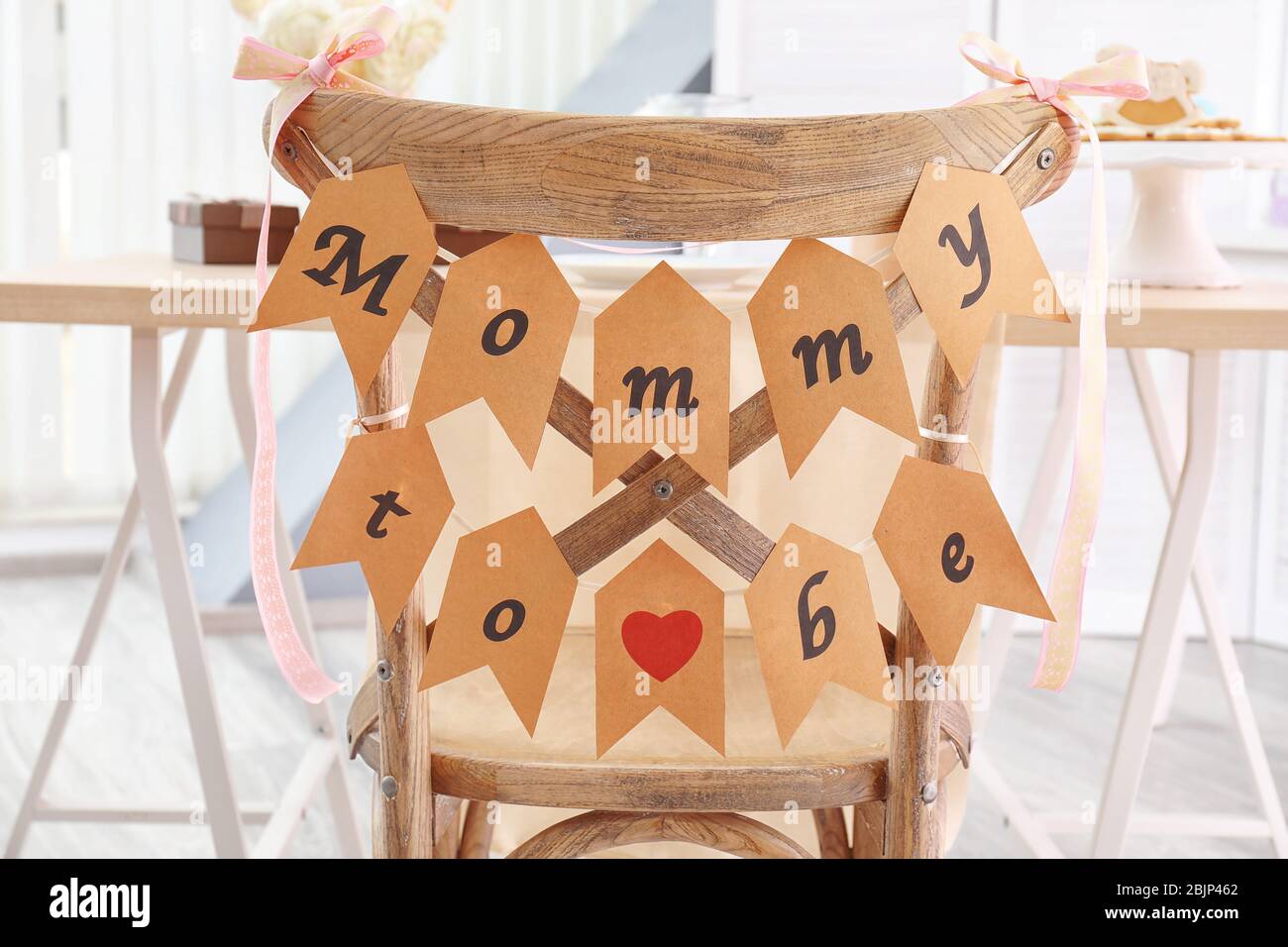 Chair decorated with cards, indoors Stock Photo - Alamy