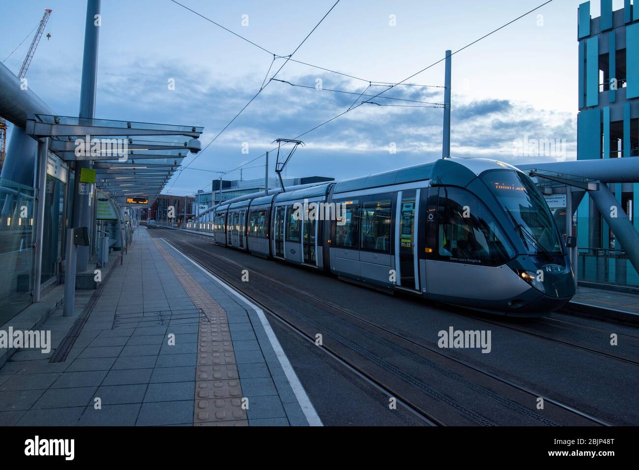 Train station tram stop at sunrise, Nottingham City South side captured ...