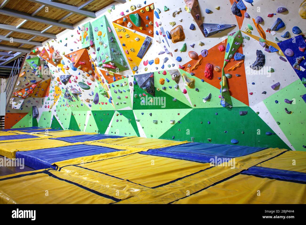 Interior of modern climbing gym Stock Photo - Alamy