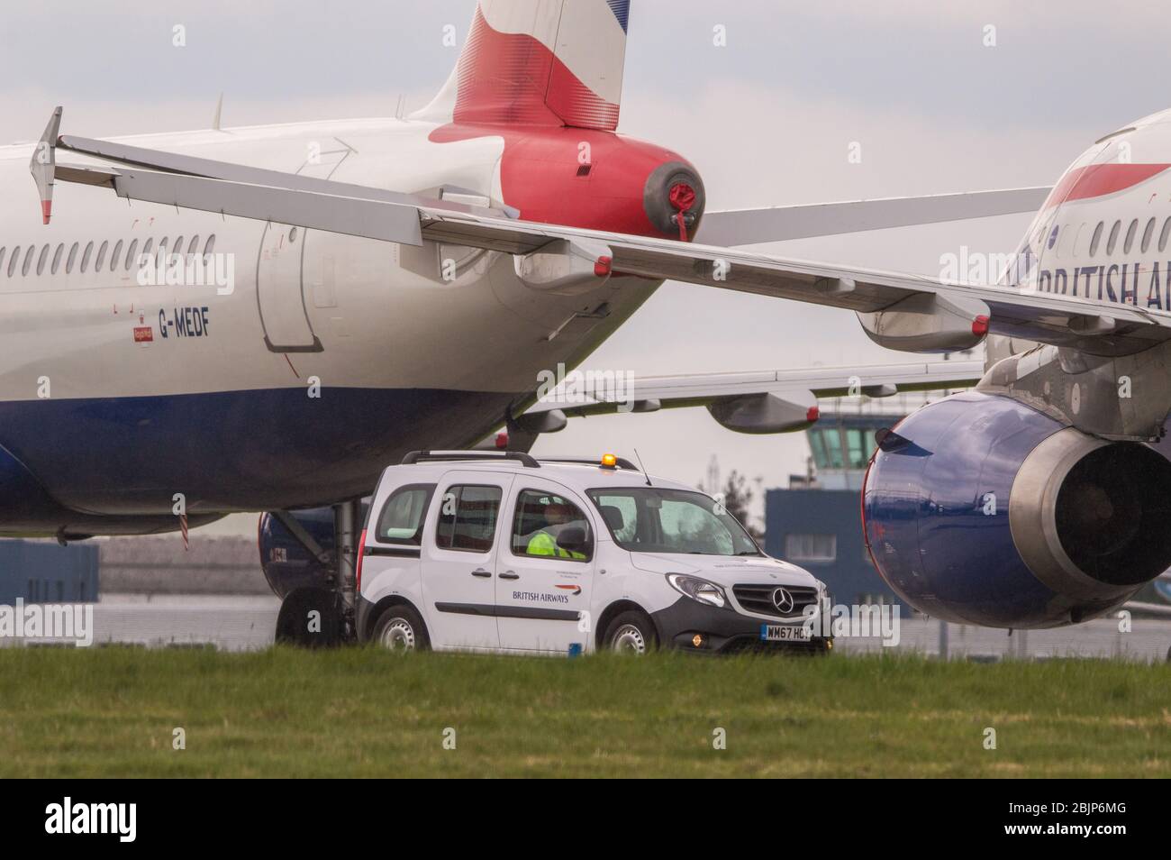 British airways ground vehicle with ground crew hi-res stock ...