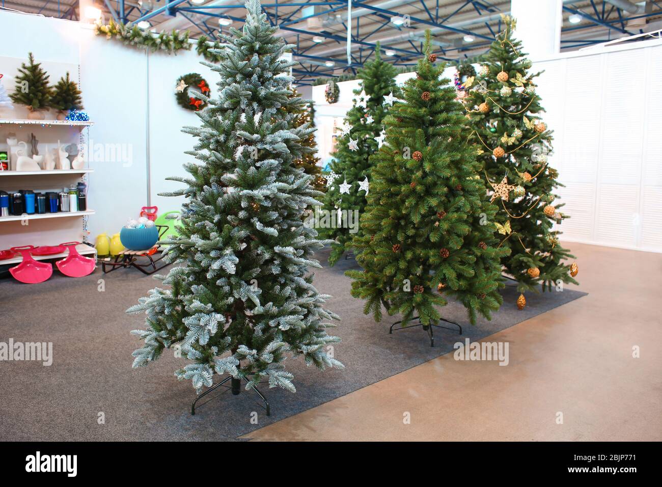 Christmas trees in shopping center Stock Photo - Alamy