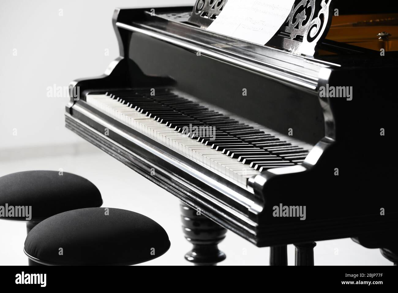 Beautiful grand piano indoors Stock Photo - Alamy