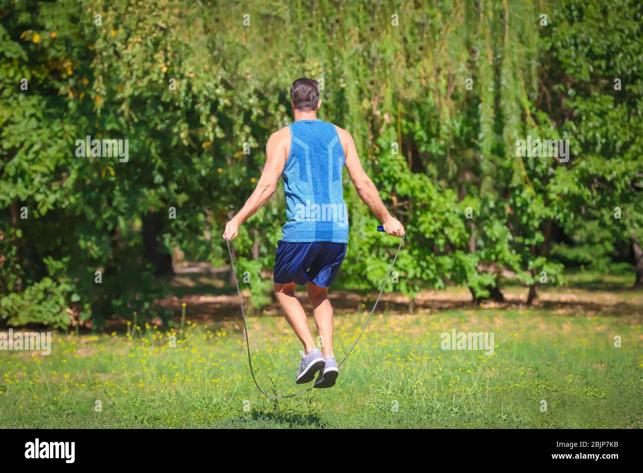 Skipping rope man park hi-res stock photography and images - Alamy