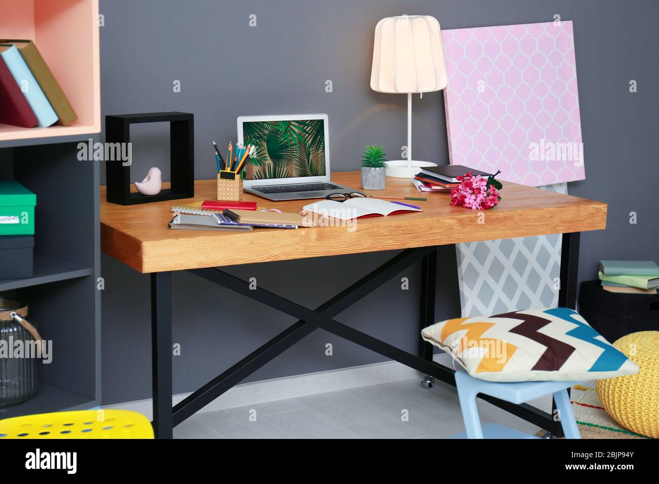 Modern room interior with laptop on table Stock Photo - Alamy