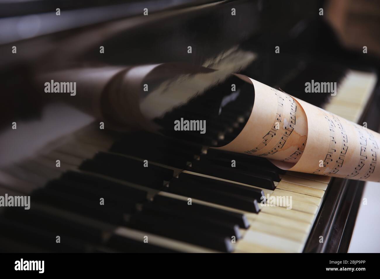 Music sheets on piano, close up Stock Photo - Alamy