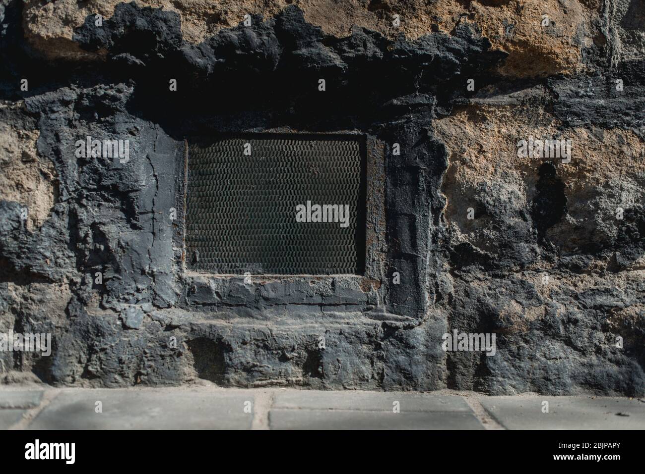 rustic air vent window on a grungy wall Stock Photo - Alamy