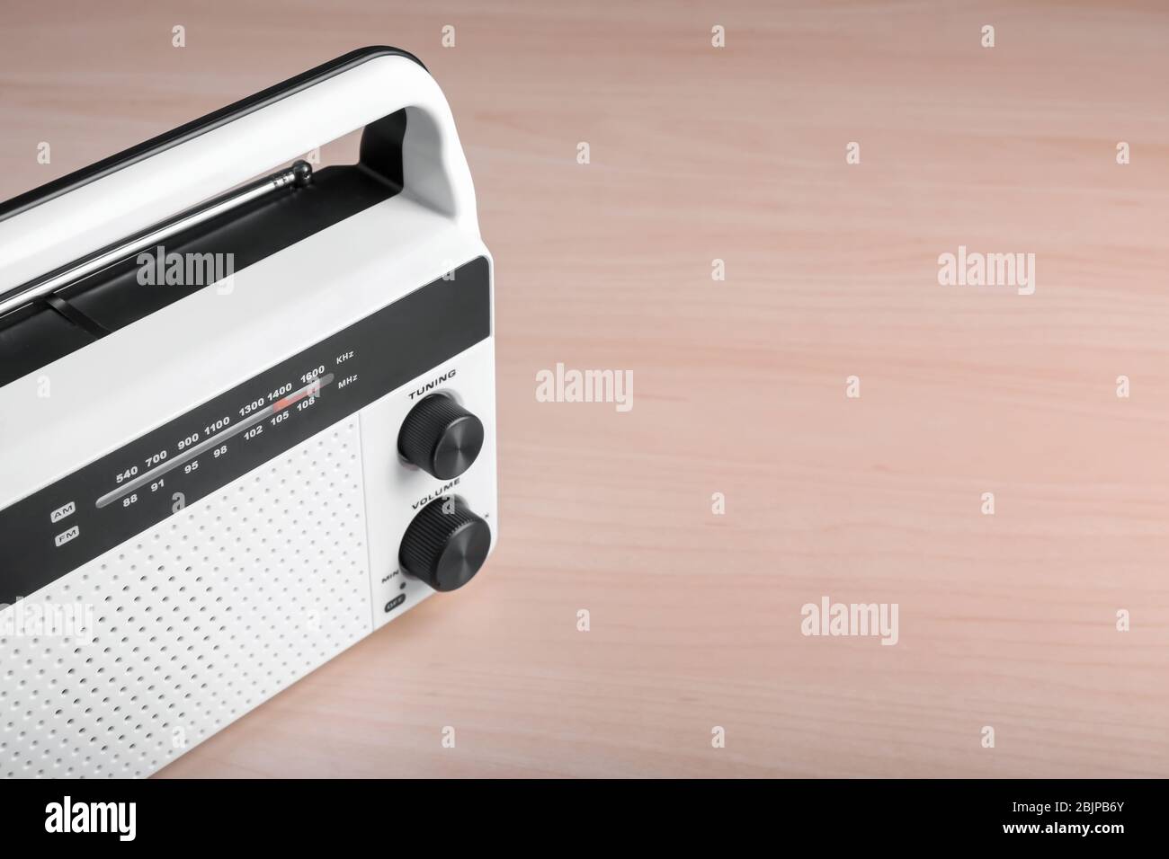 Modern radio on wooden background Stock Photo - Alamy