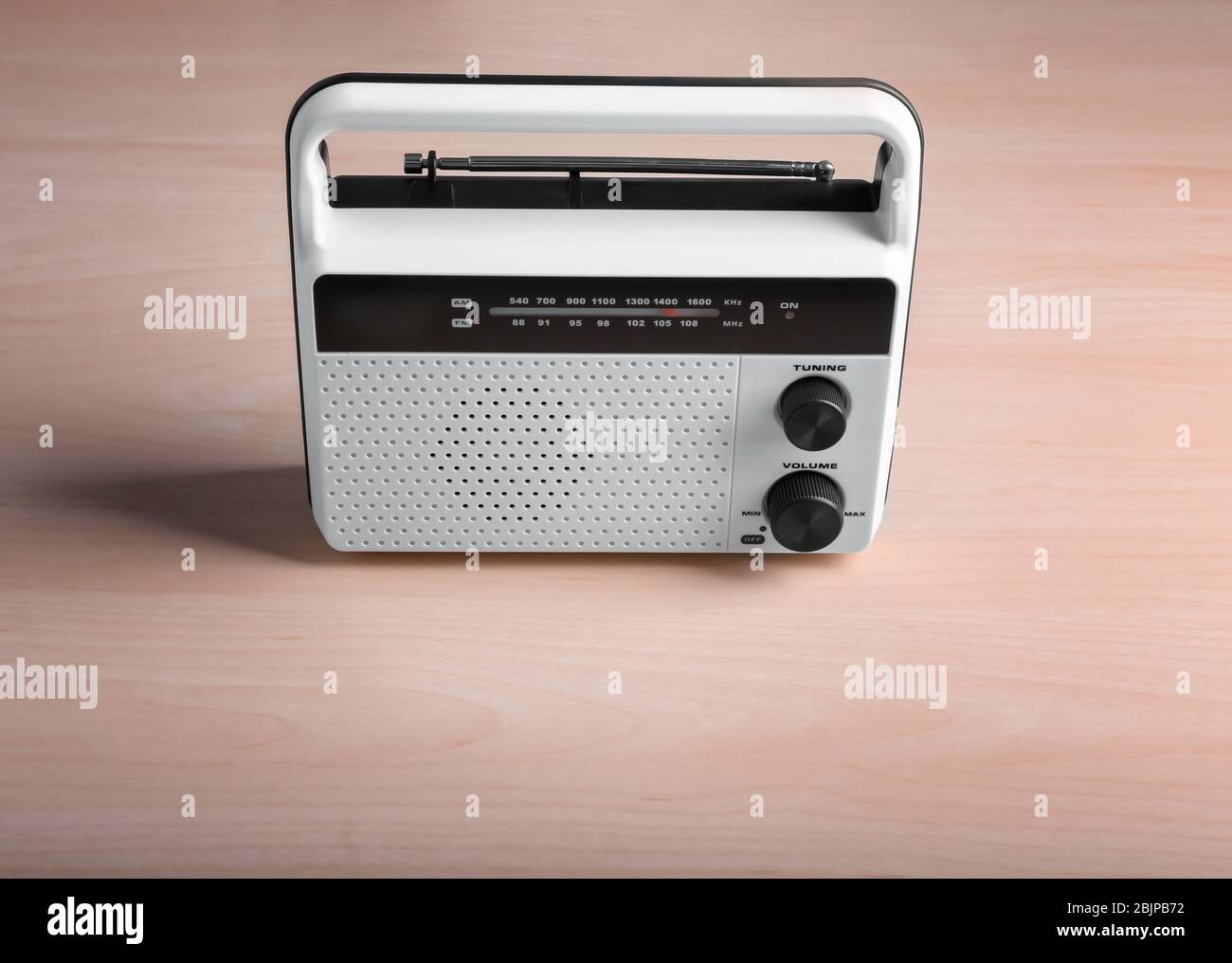 Modern radio on wooden background Stock Photo - Alamy