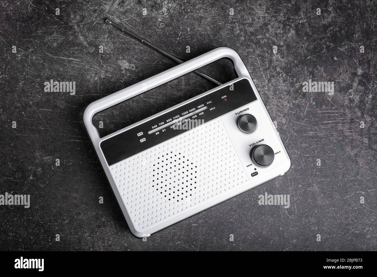 Modern radio on grunge background Stock Photo - Alamy