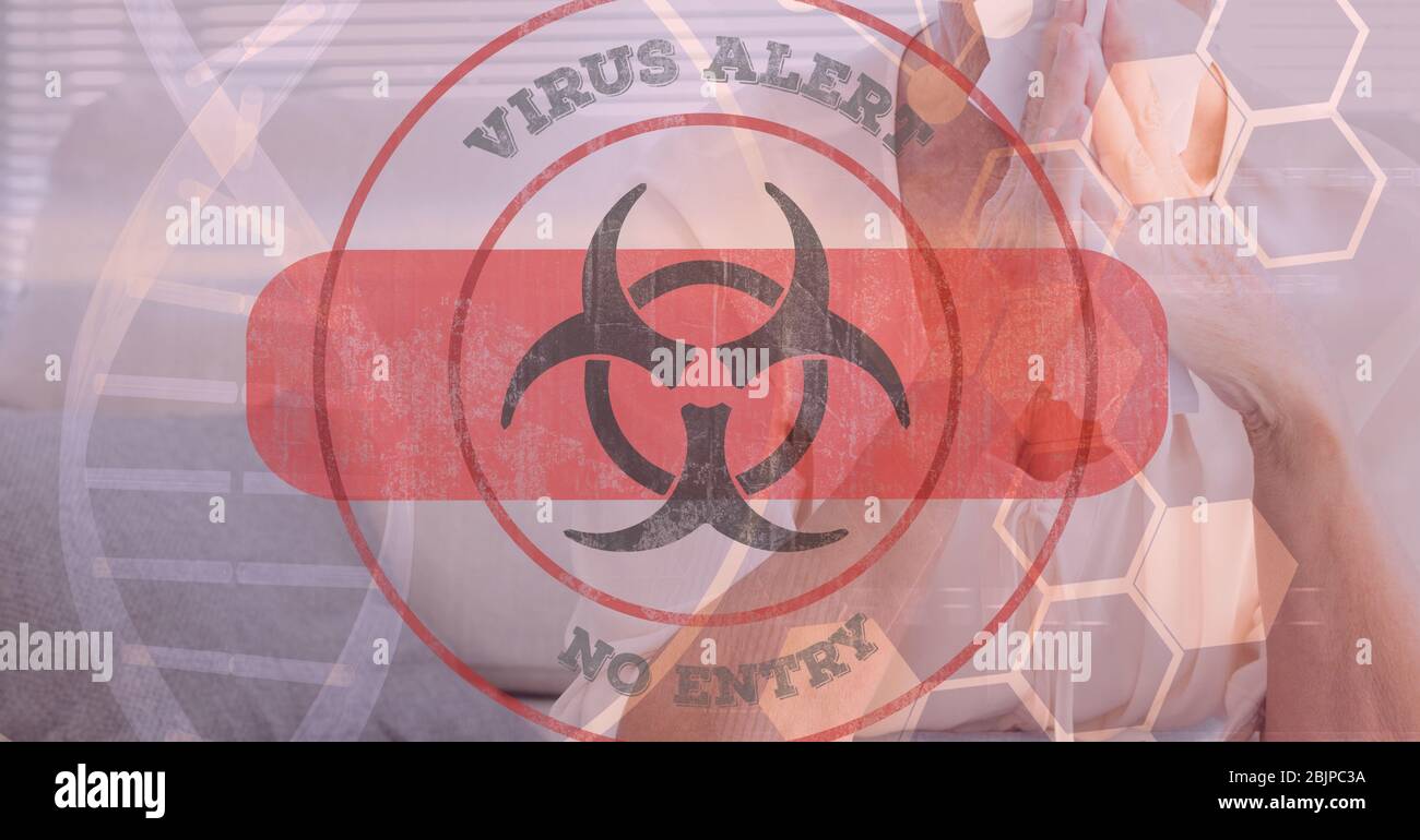 Digital illustration of a red sign with a hazard sign Stock Photo - Alamy