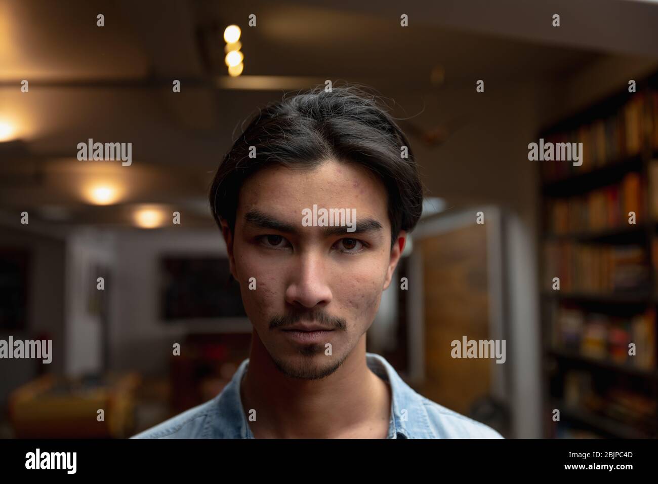 Man looking down at camera hi-res stock photography and images - Alamy