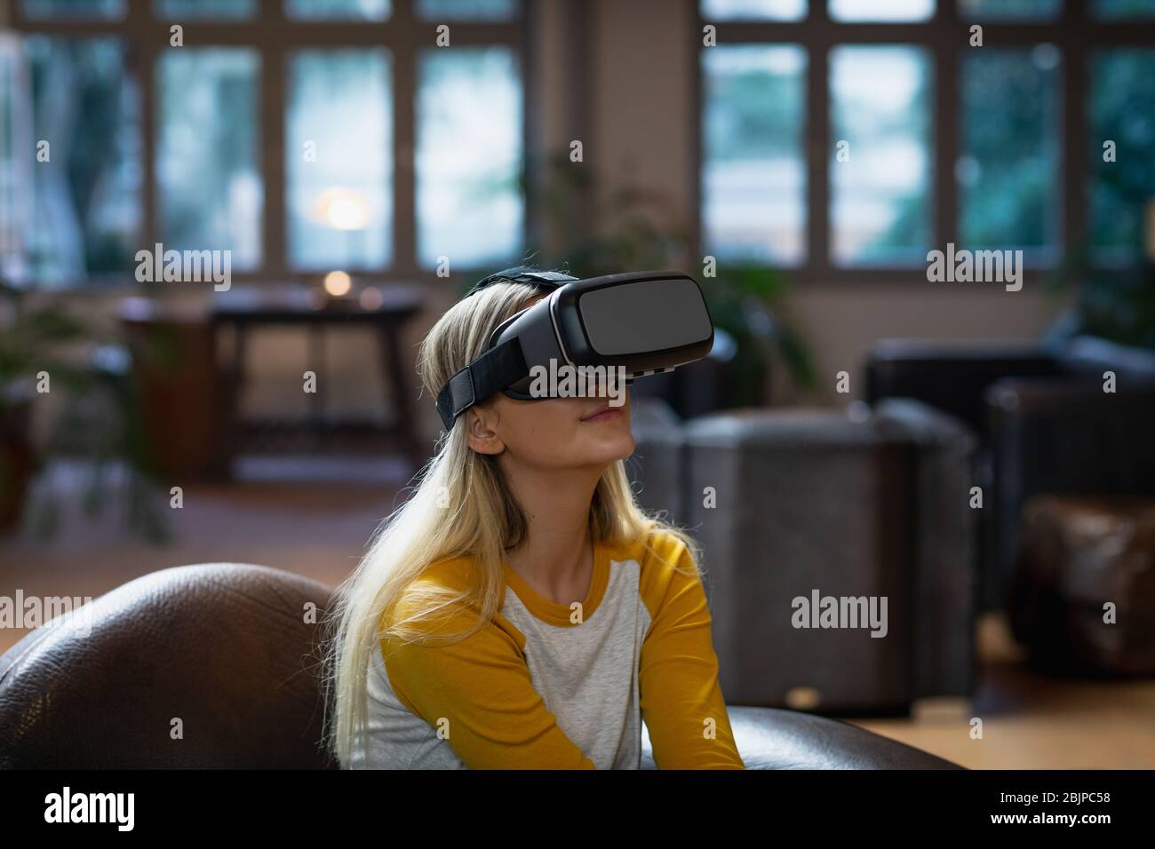 Using a vr headset hi-res stock photography and images - Alamy